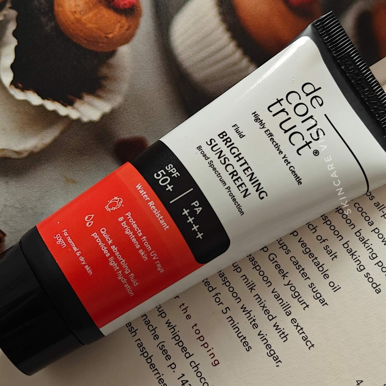 Deconstruct Fluid Brightening Sunscreen Review - Skincare Villa